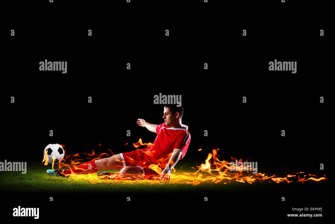 Football player with ball Stock Photo - Alamy