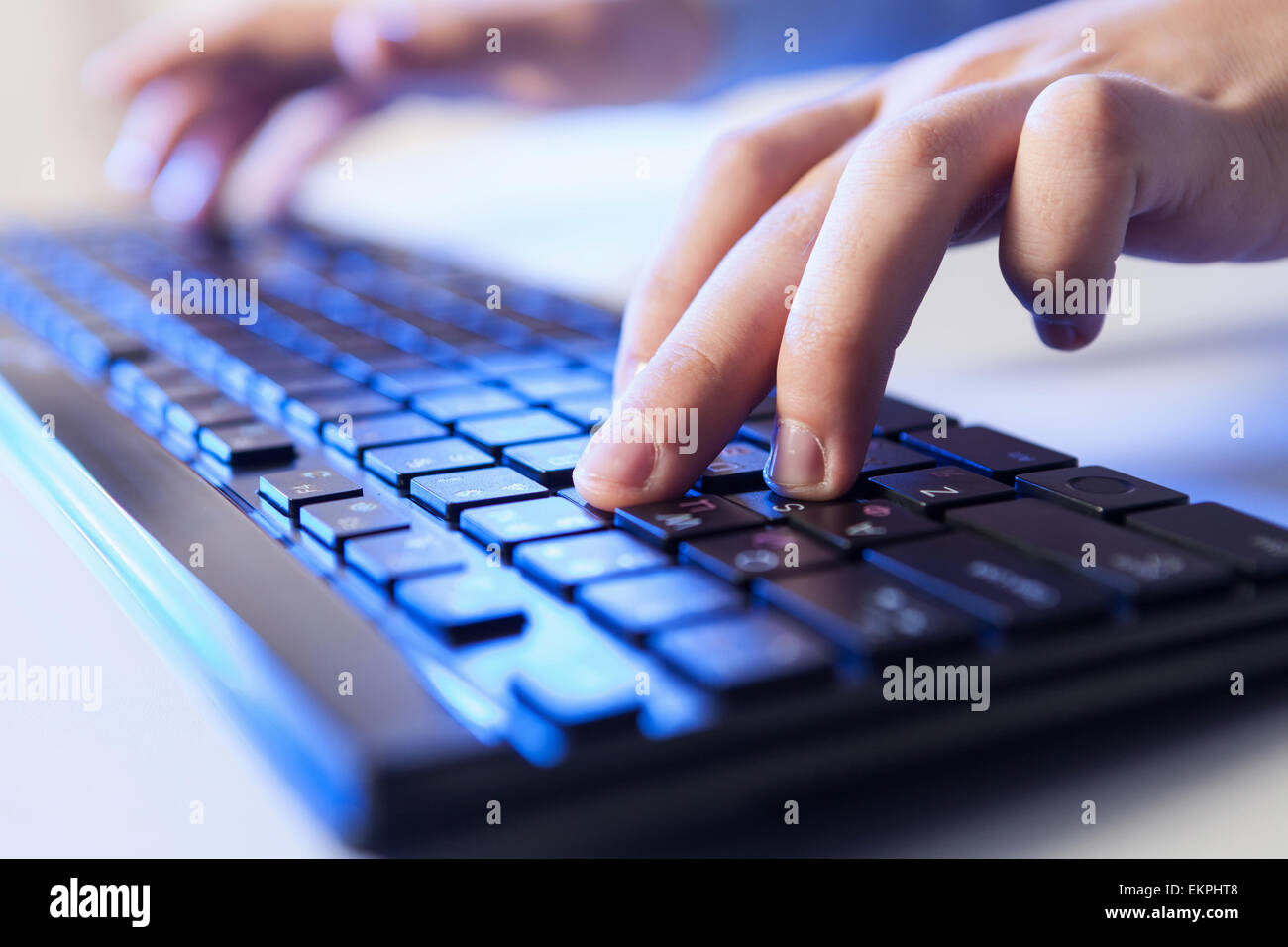 Click! Hands of a man on keyboard Stock Photo - Alamy