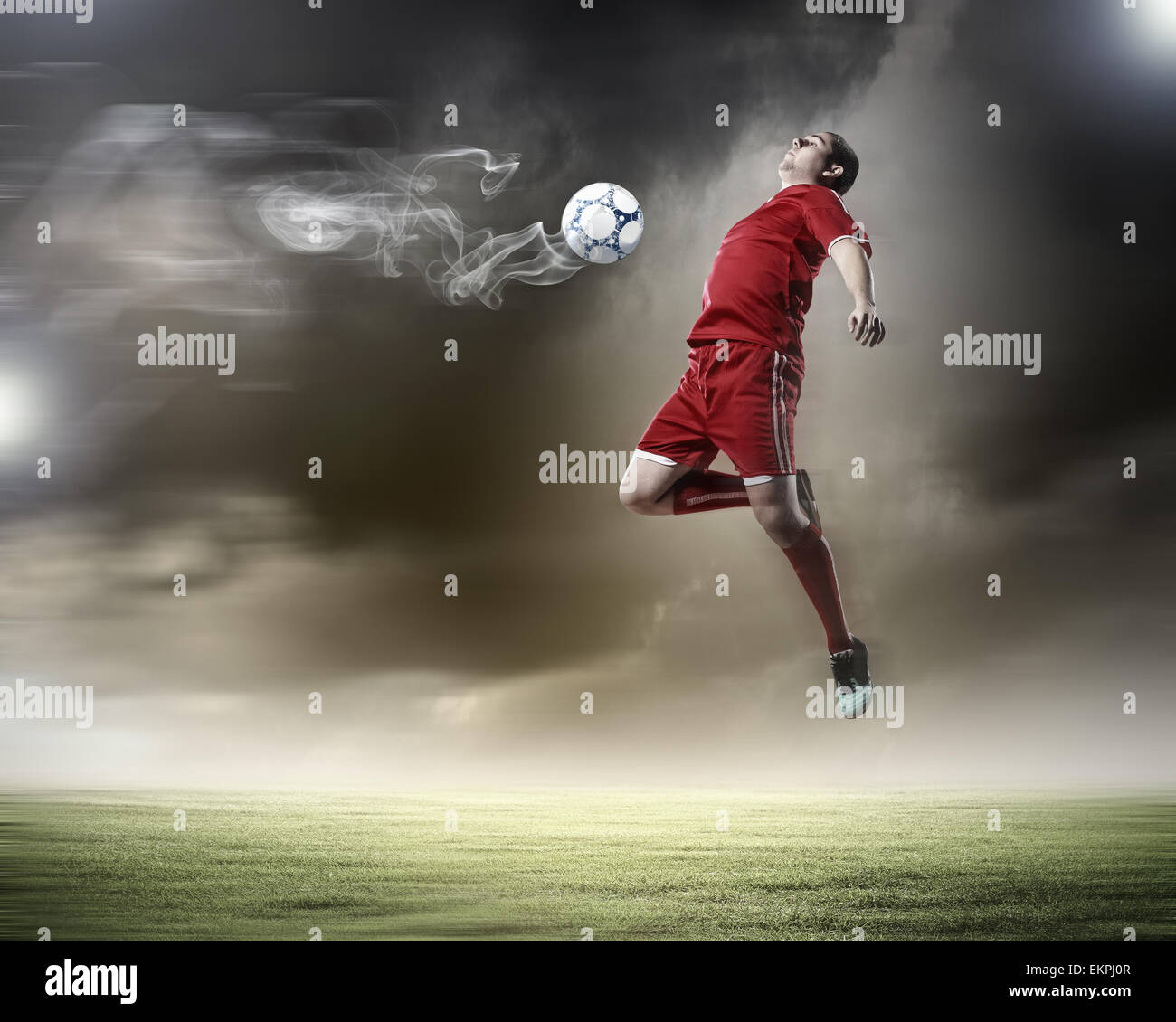 football player striking the ball Stock Photo - Alamy