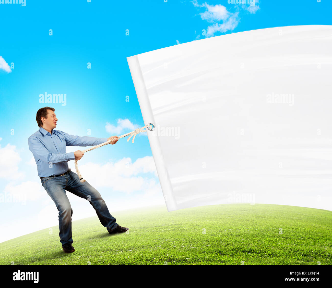 Adult man pulling blank banner Stock Photo - Alamy