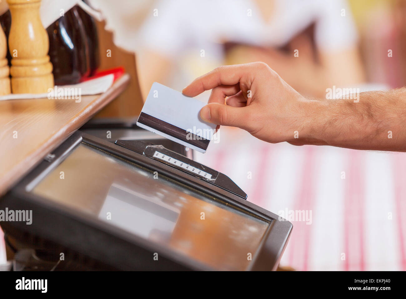 Close-up of cashier hands Stock Photo - Alamy