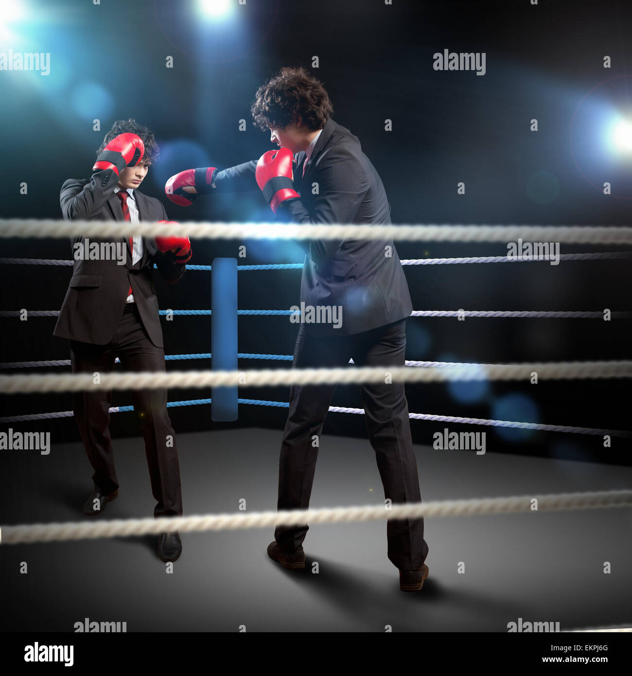 Two young businessman boxing Stock Photo - Alamy