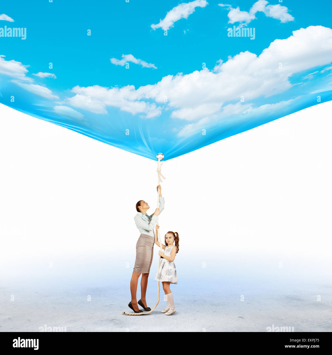 Family pulling banner Stock Photo - Alamy