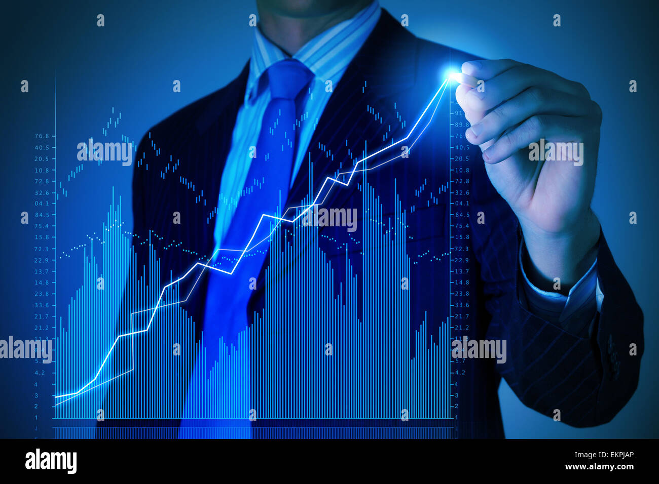 Business man drawing graphics Stock Photo - Alamy