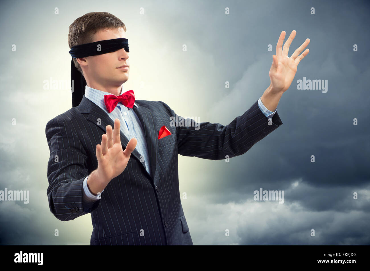 young blindfolded man Stock Photo - Alamy