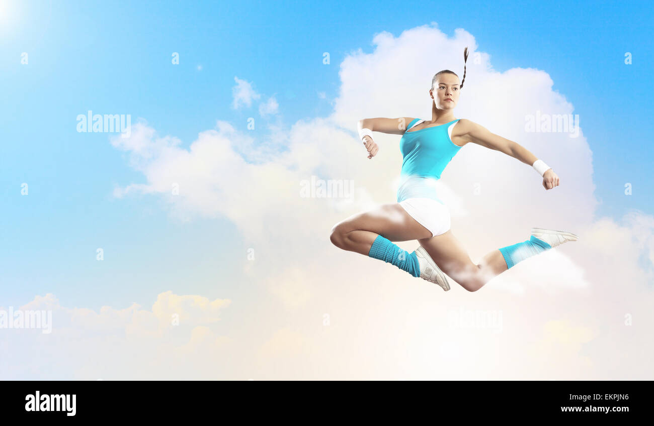 Image of sport woman jumping Stock Photo - Alamy