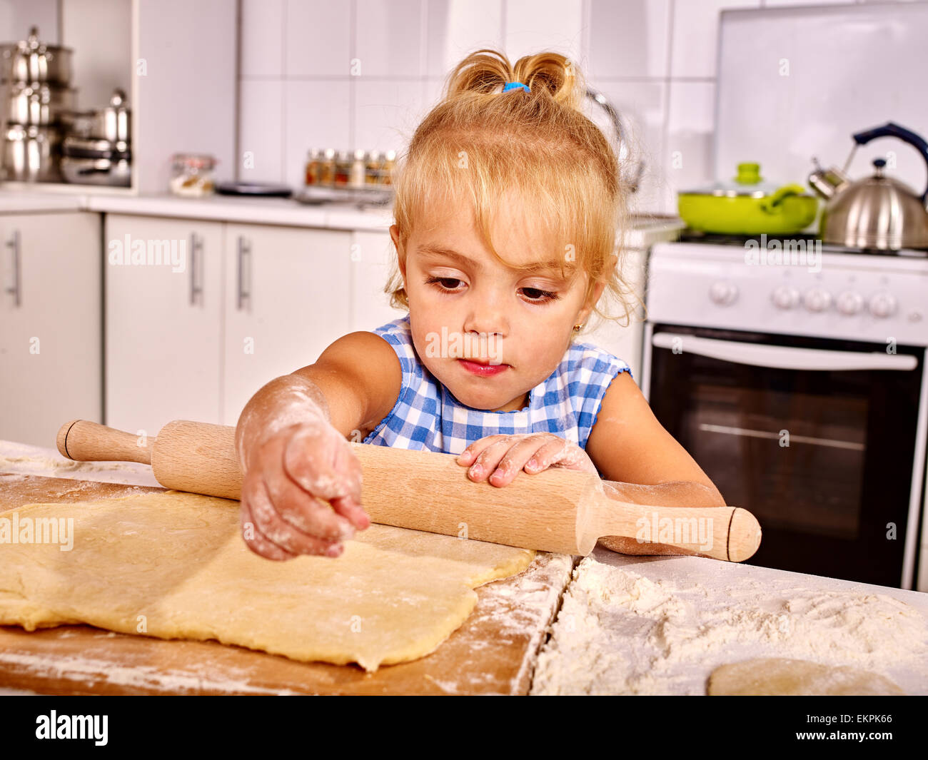 Child with rolling-pin dough Stock Photo - Alamy Child with rolling-pin dough Stock Photo - Alamy