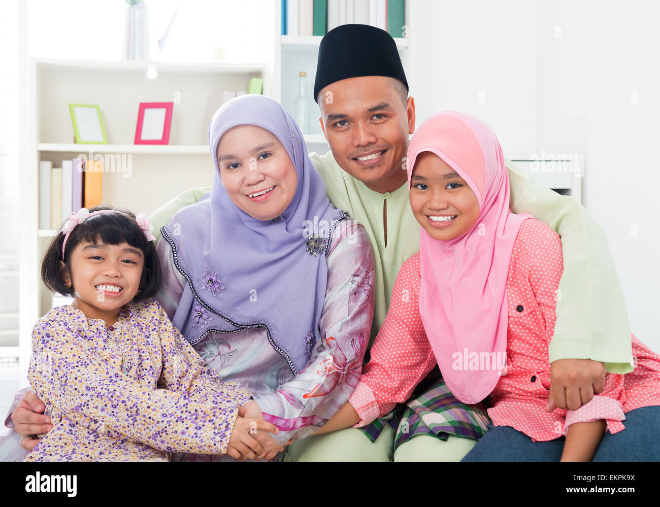 Happy Asian family at home Stock Photo - Alamy