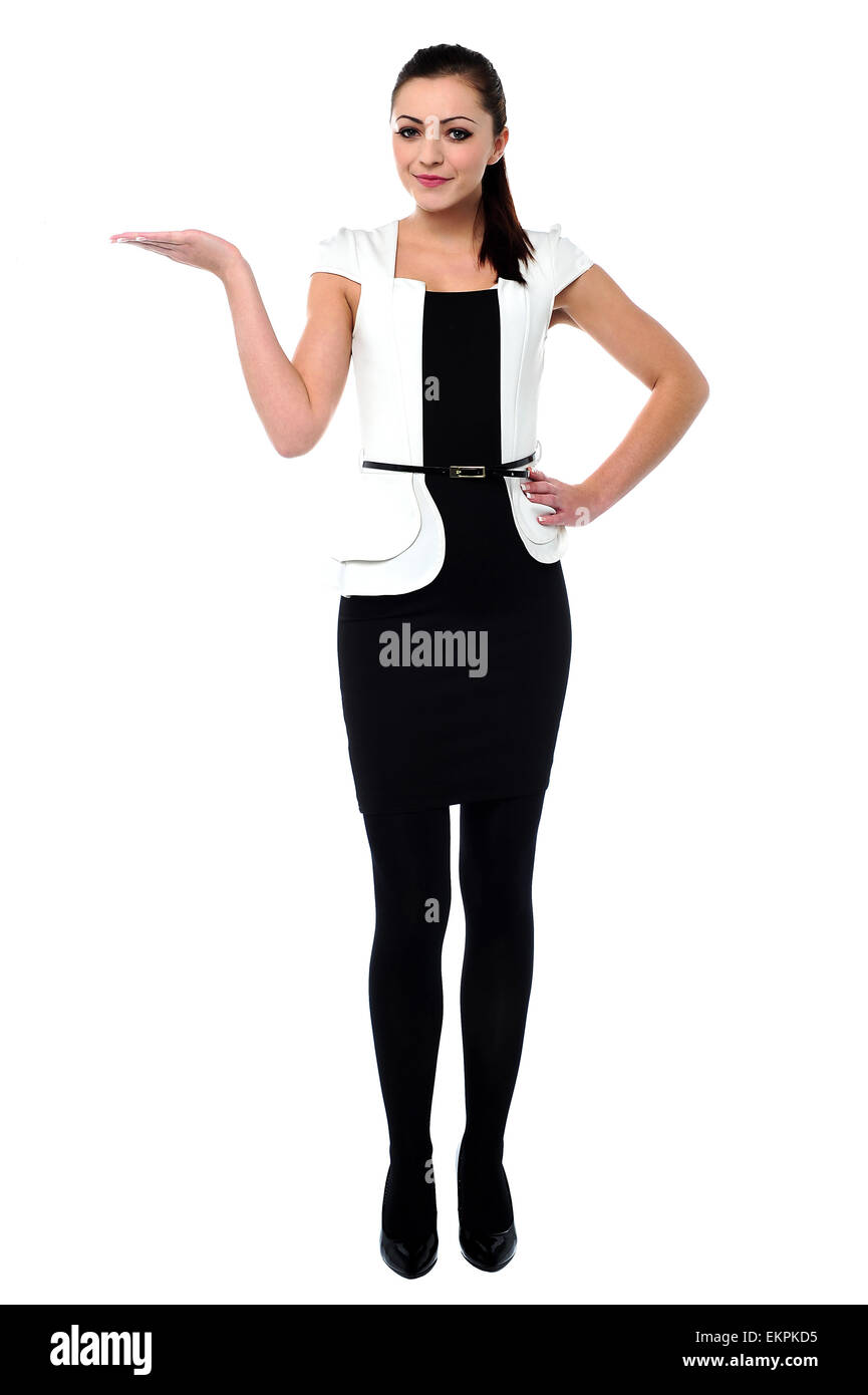 Pretty woman presenting something Stock Photo - Alamy