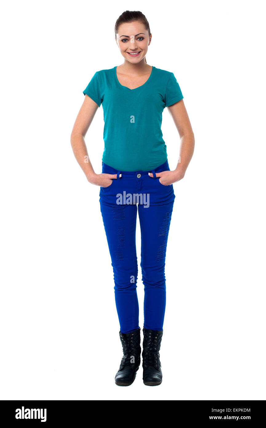 Pretty woman with hands in jeans pocket Stock Photo - Alamy