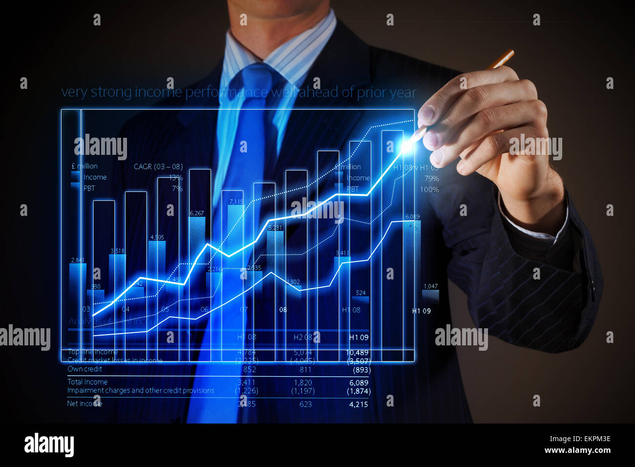 Business man drawing graphics Stock Photo - Alamy