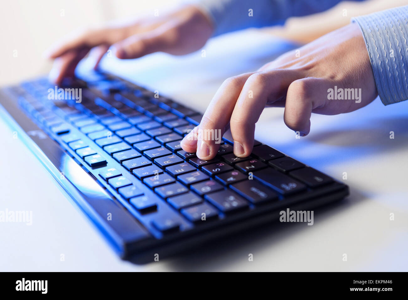 Click! Hands of a man on keyboard Stock Photo - Alamy
