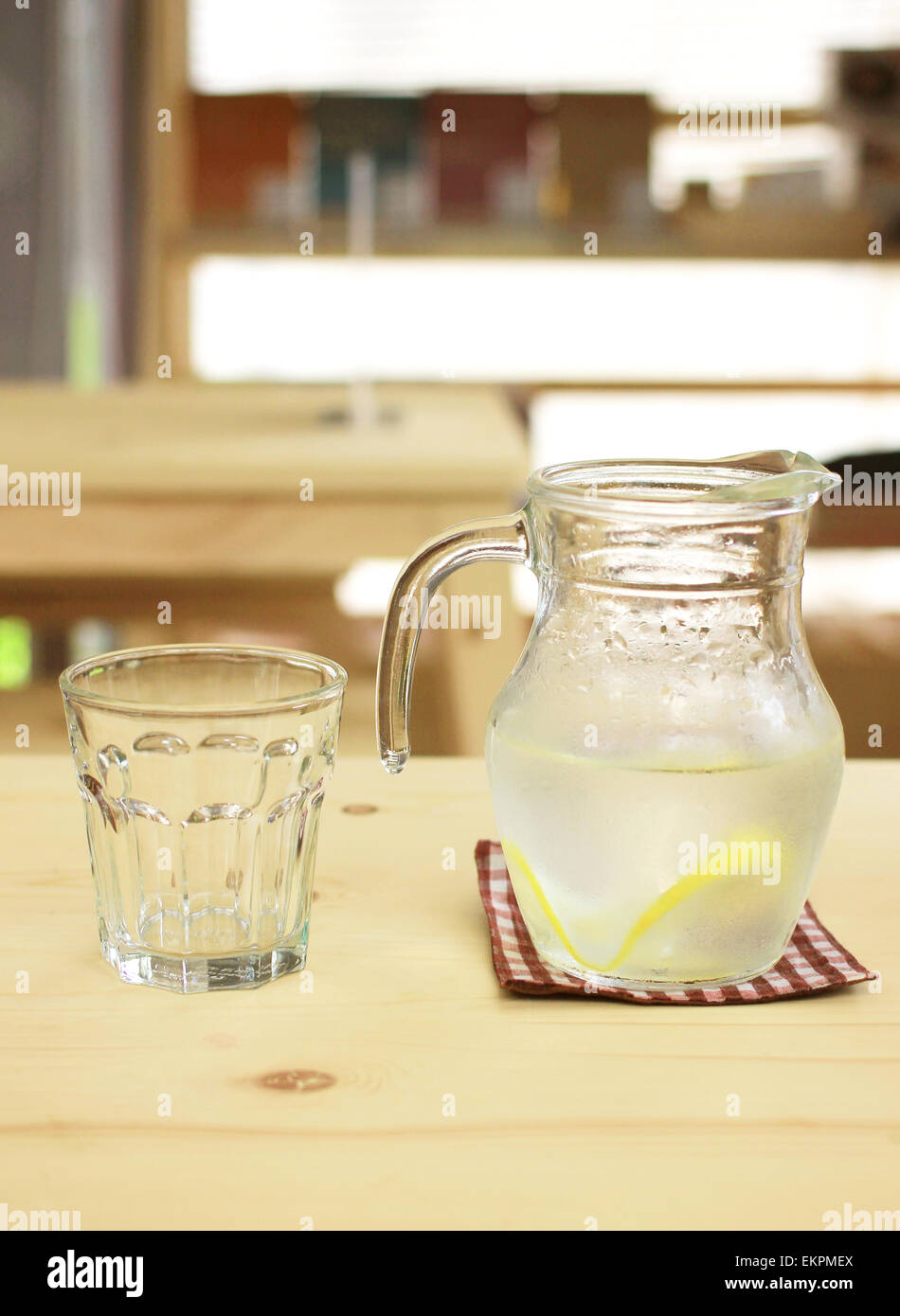 Jar of lemonade with empty glass for summer Stock Photo - Alamy