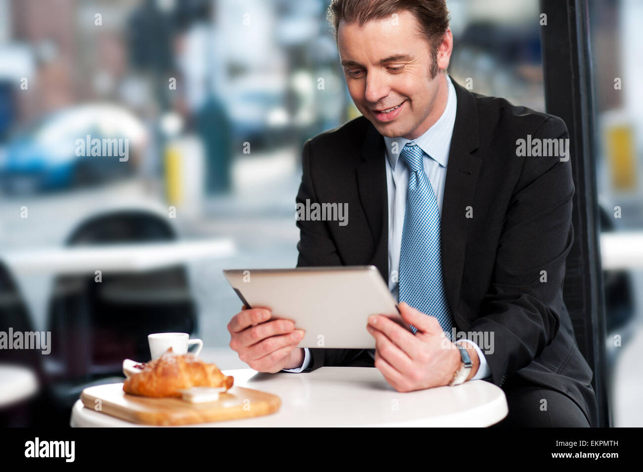 Business executive at open restaurant Stock Photo - Alamy