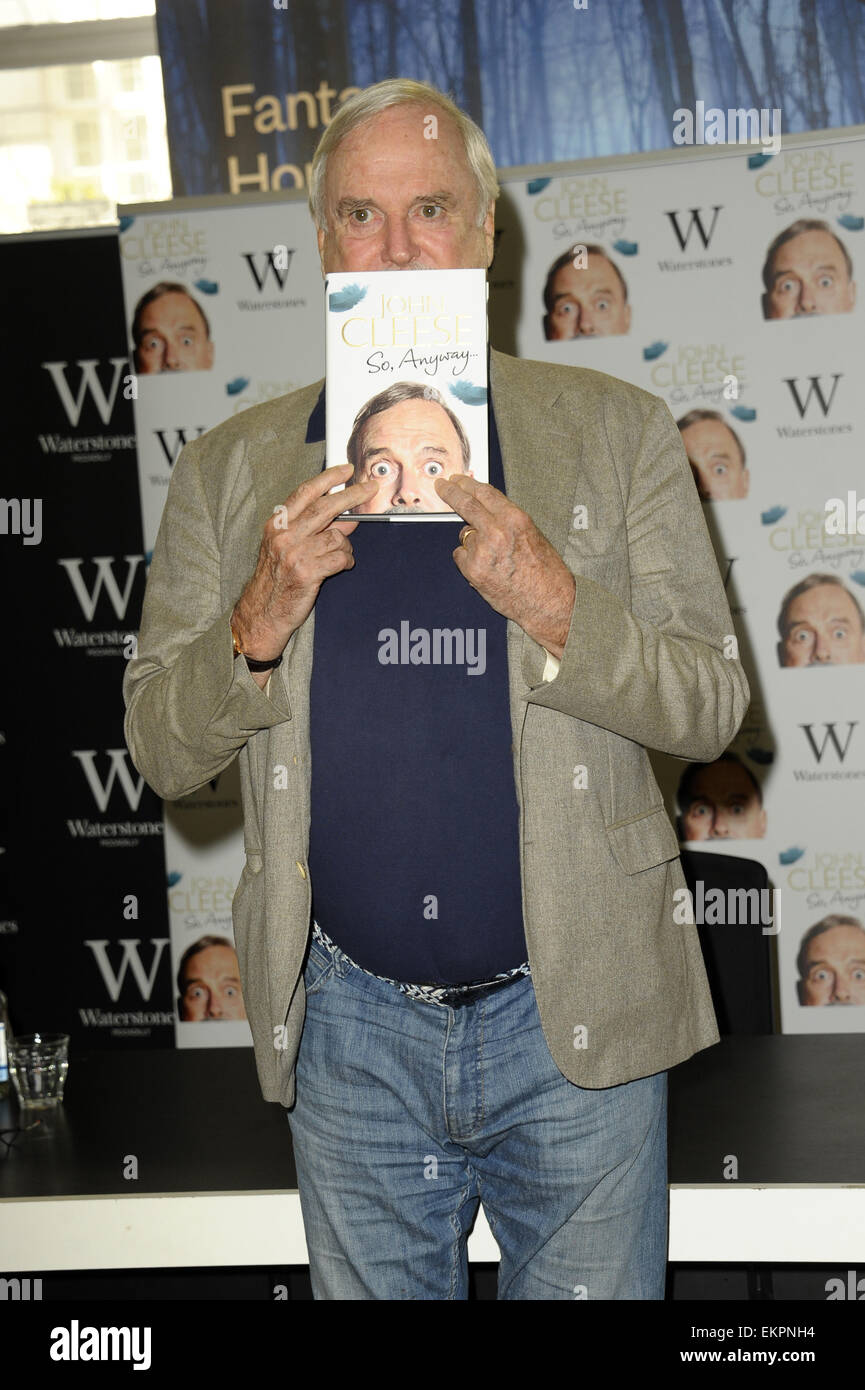 John cleese signs copies of his book hi-res stock photography and ...