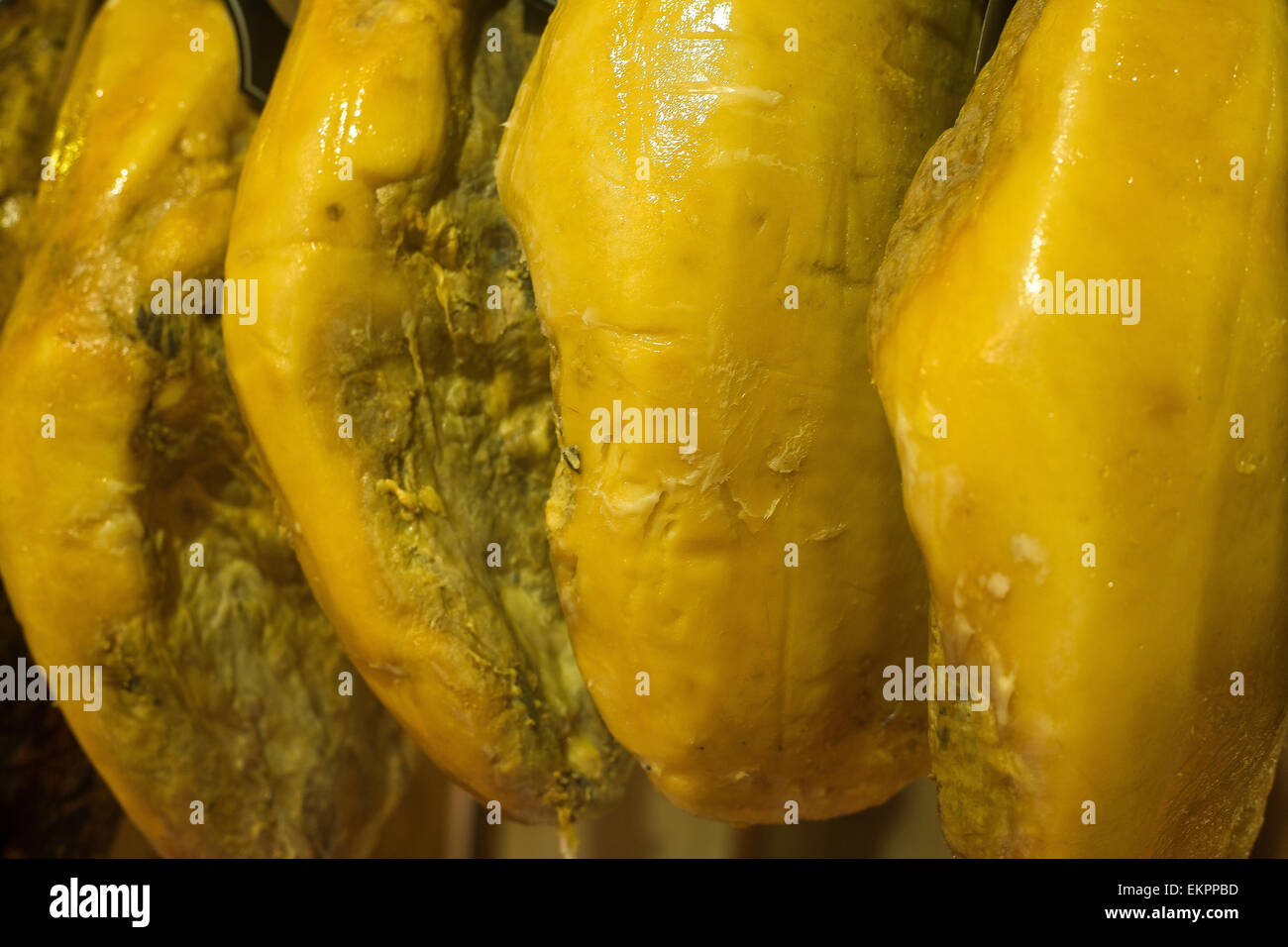 Legs of cured meat hanging at a market, Extremadura, Spain Stock Photo ...