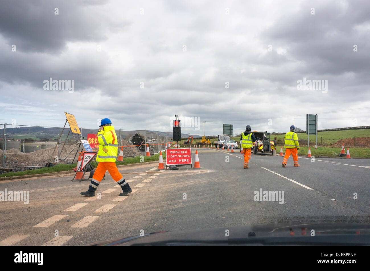 Roadworks and road construction workers on a rural country road Stock ...