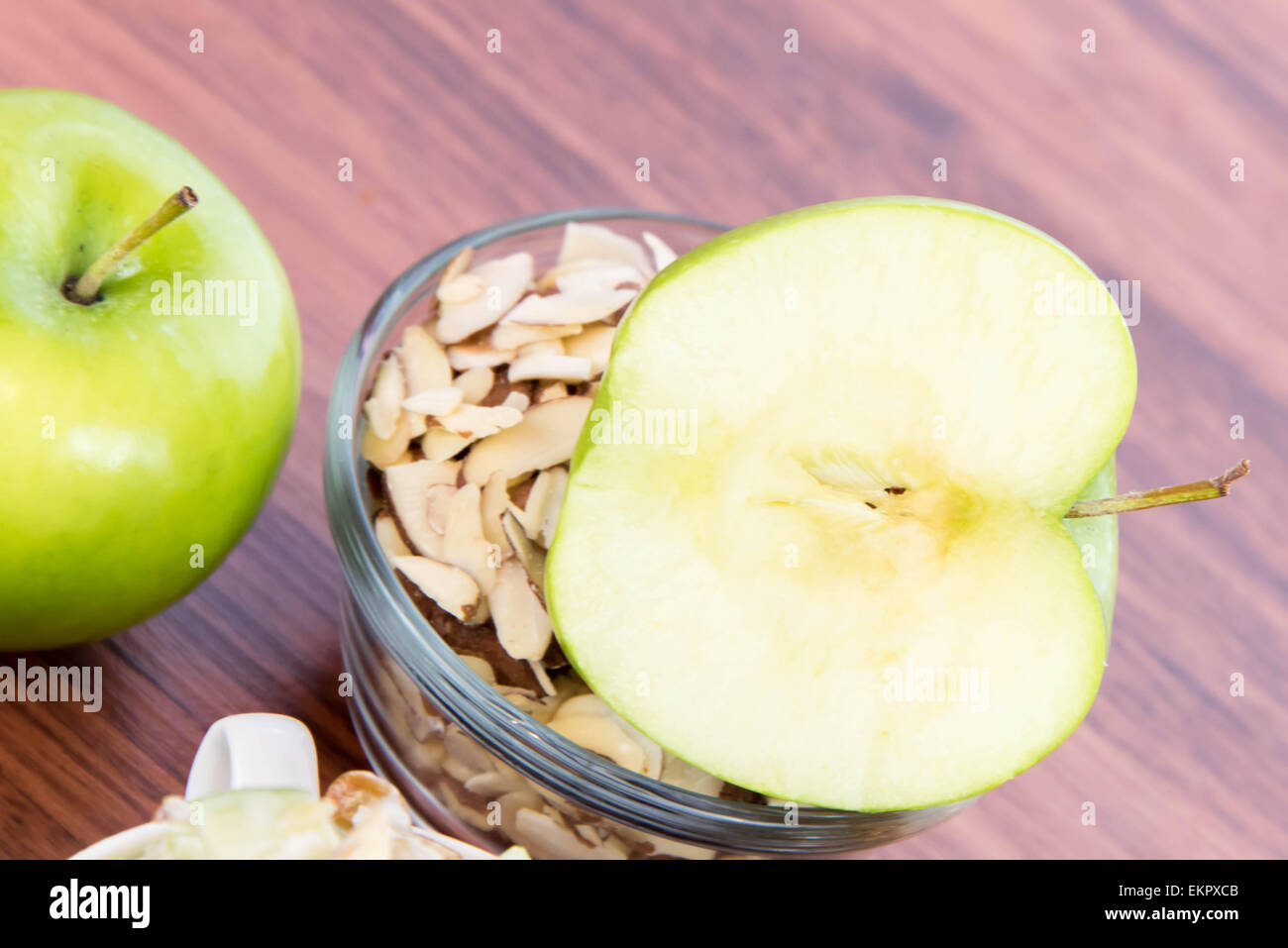 healthy snack: apple slices and nuts Stock Photo - Alamy