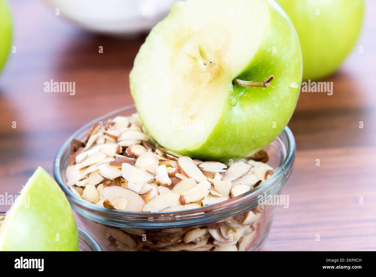 healthy snack: apple slices and nuts Stock Photo - Alamy