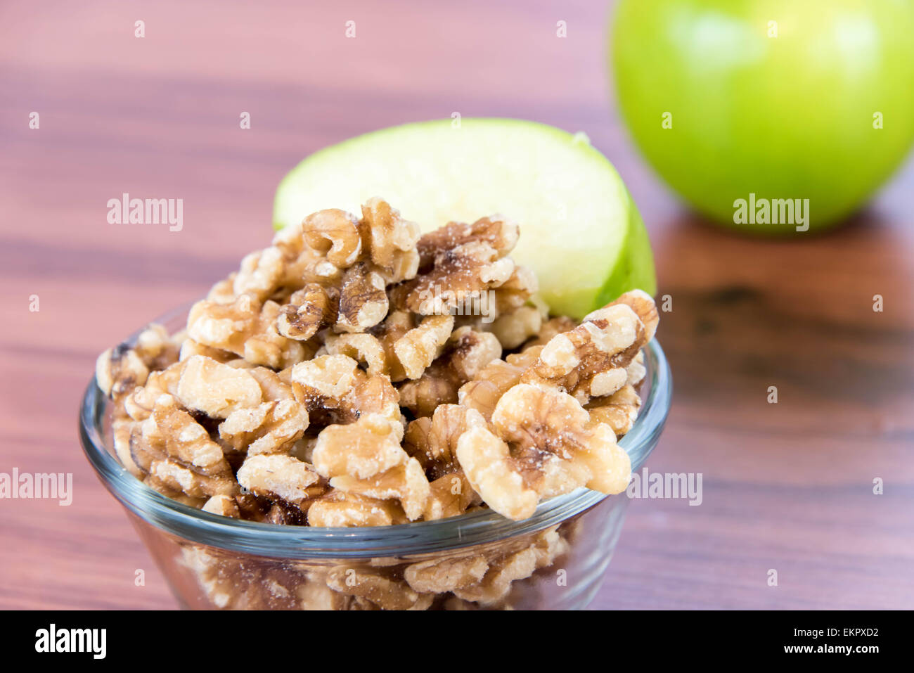 healthy snack: apple slices and nuts Stock Photo - Alamy