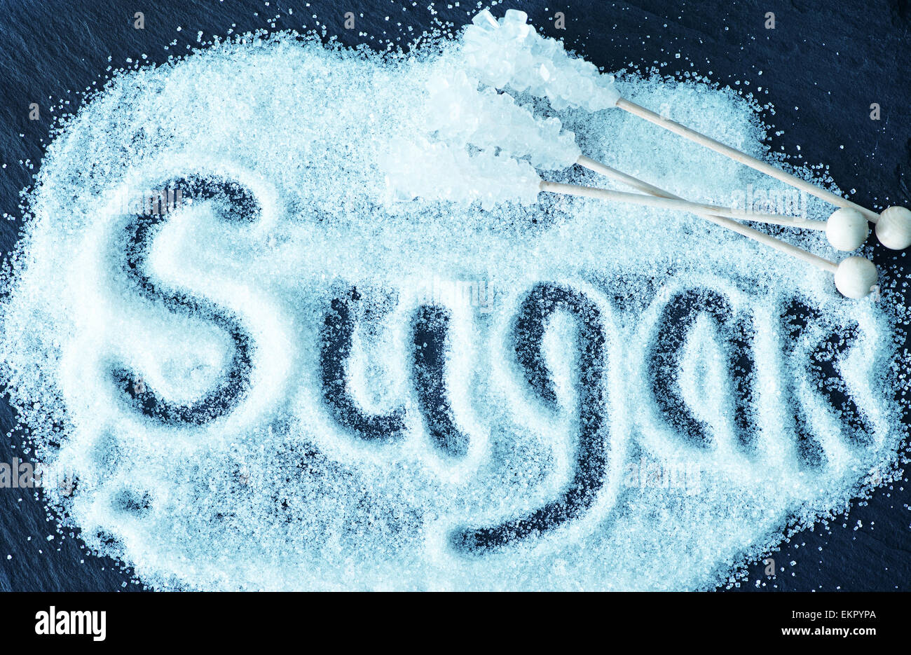 text on white sugar, sugar on the table Stock Photo - Alamy