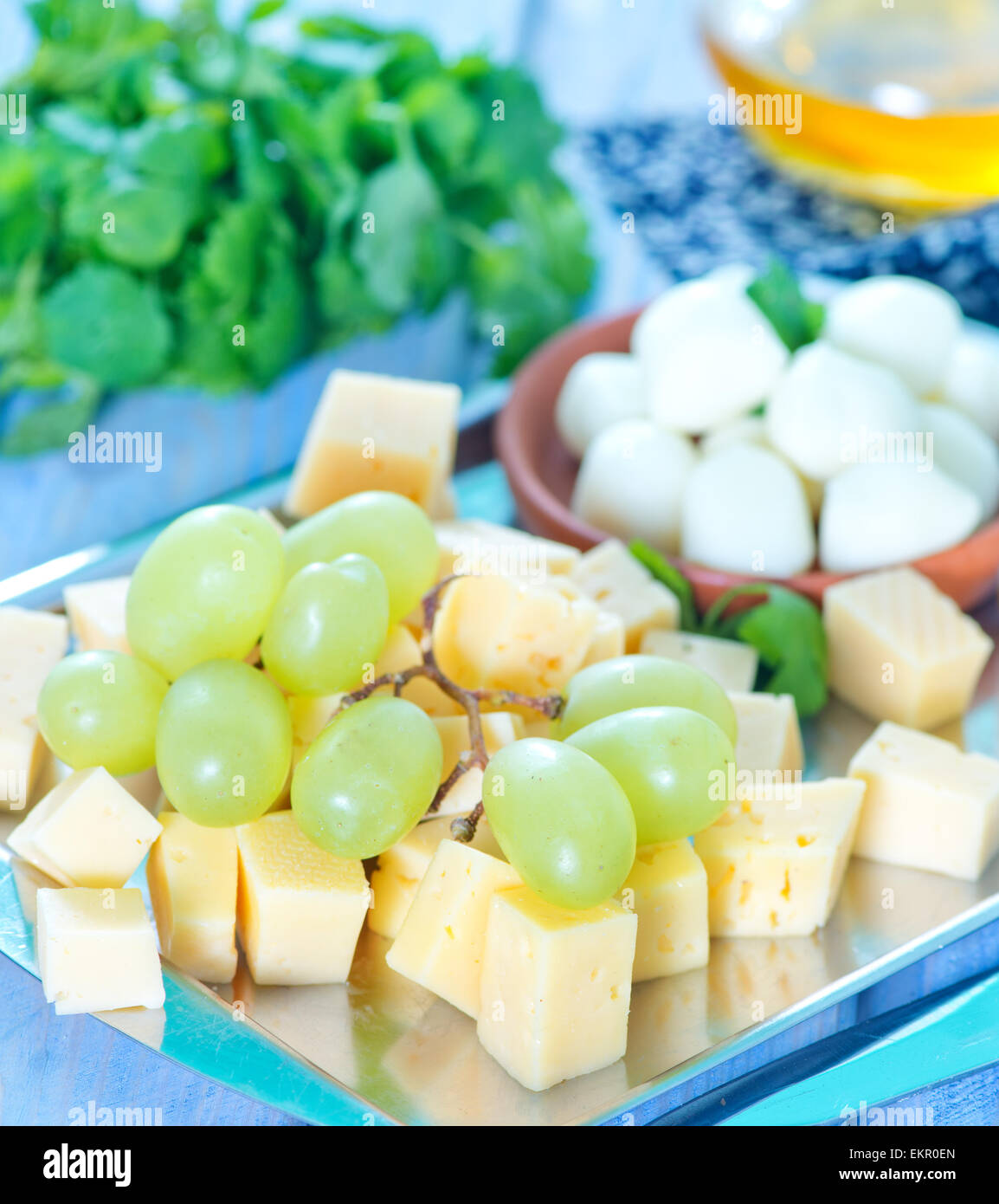 cheese cubes and grape on metal tray Stock Photo - Alamy