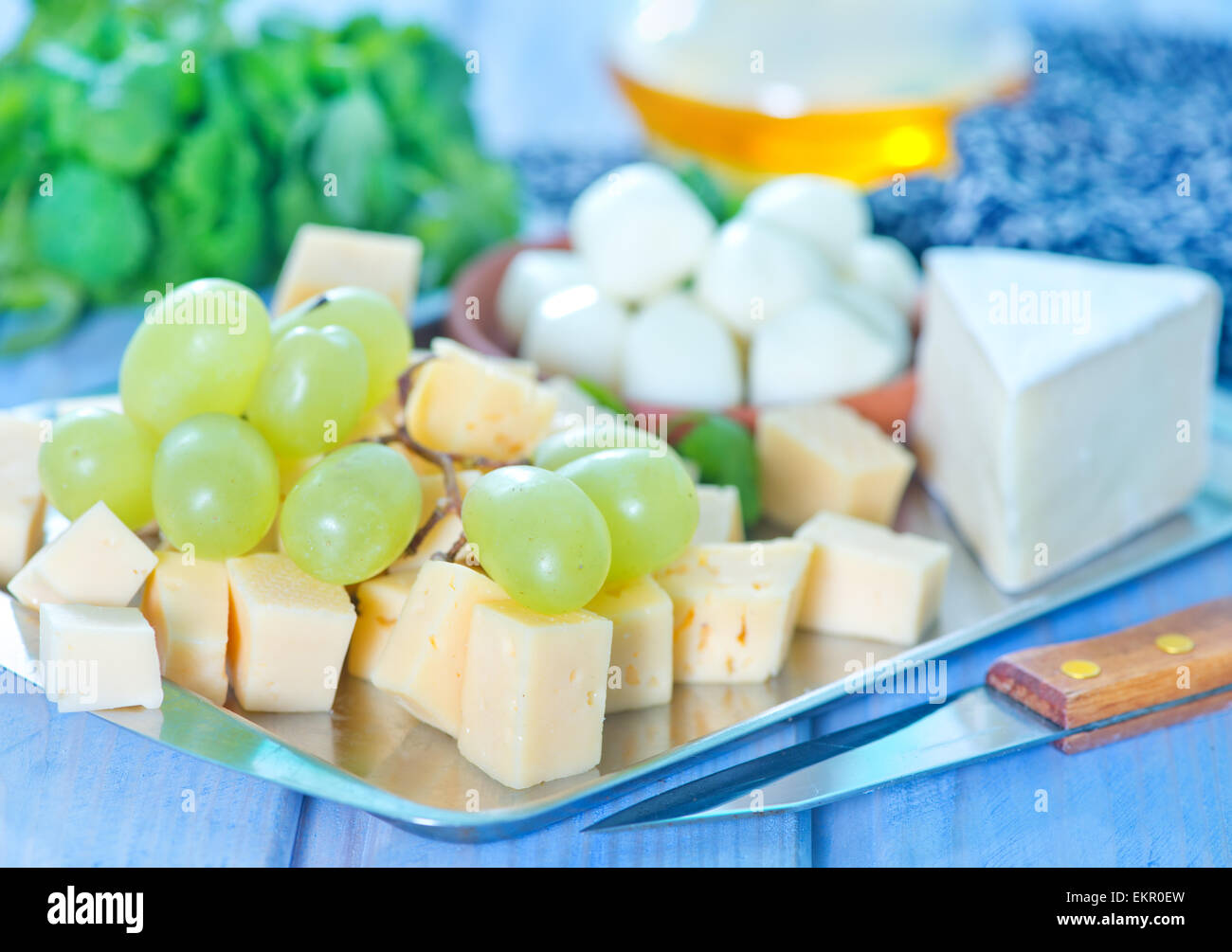 cheese cubes and grape on metal tray Stock Photo - Alamy