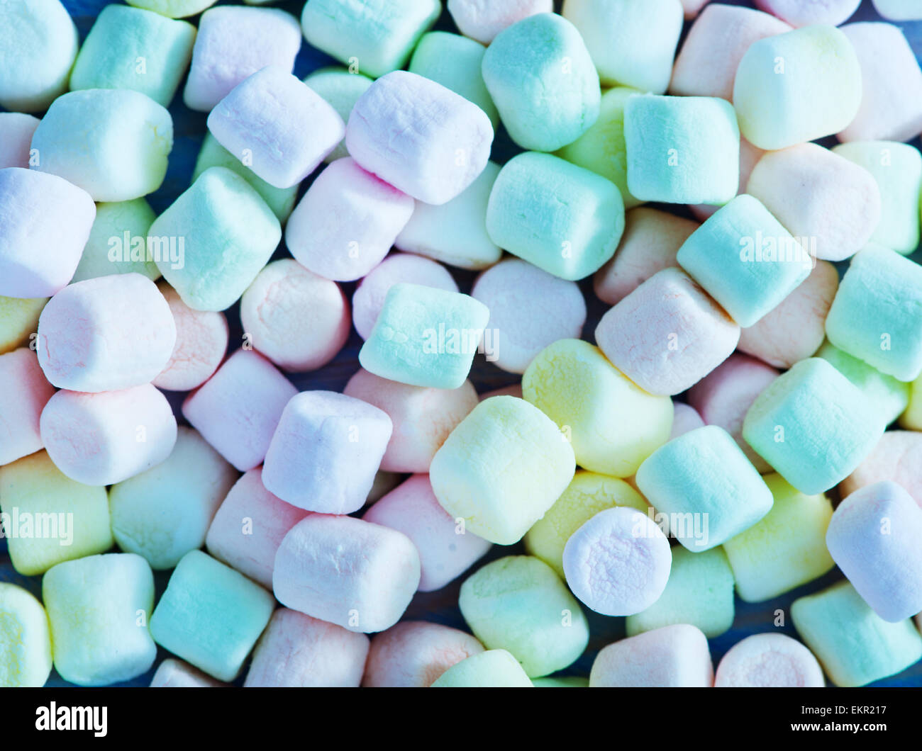 color marshmallows on the wooden table, color candy Stock Photo - Alamy