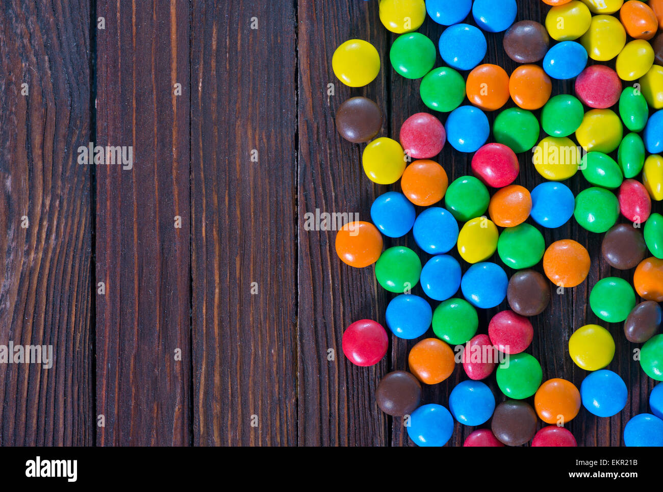 color candy on a table, background from color chocolate candy Stock ...