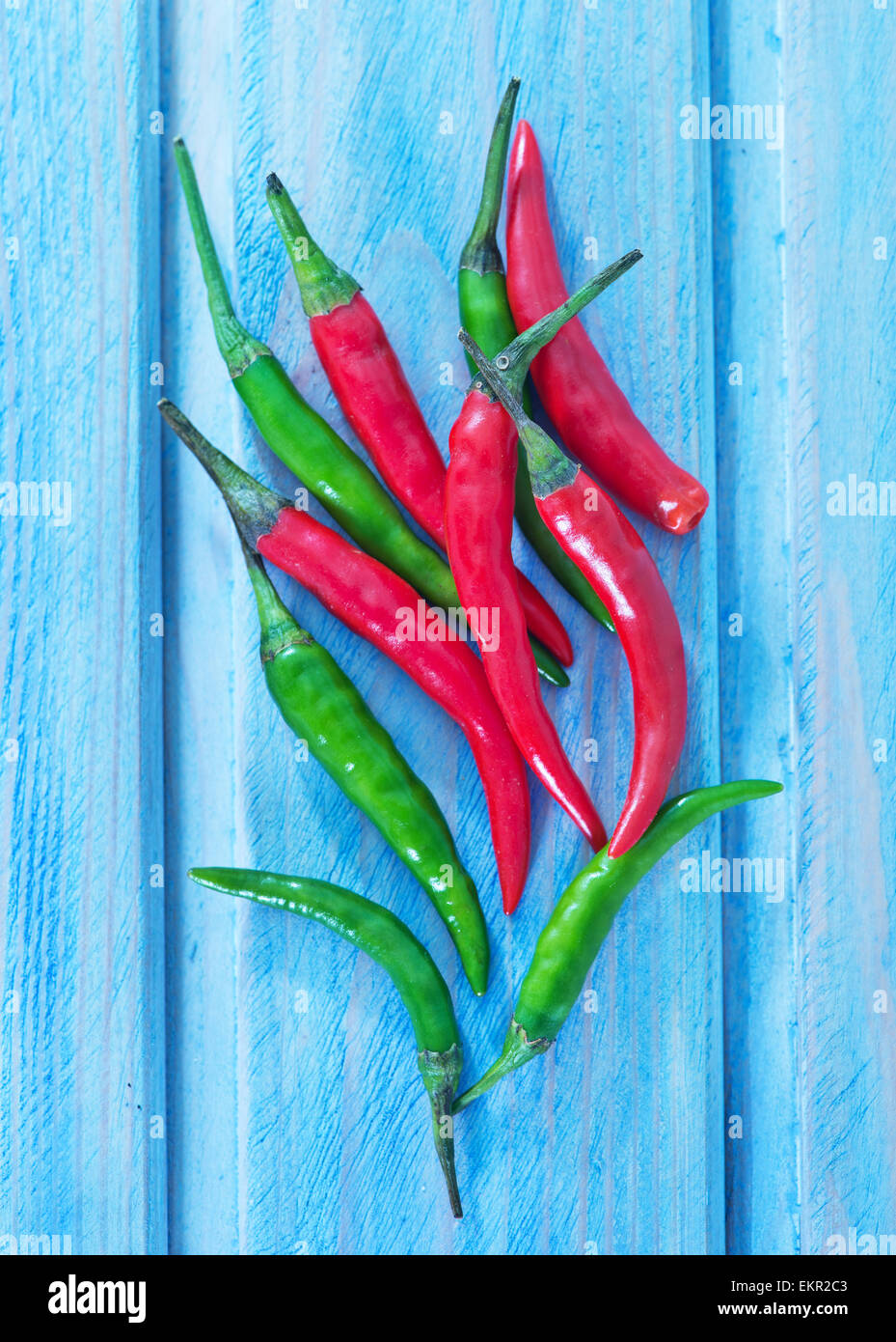 chilli pepper on the blue background, fresh chilli pepper Stock Photo ...
