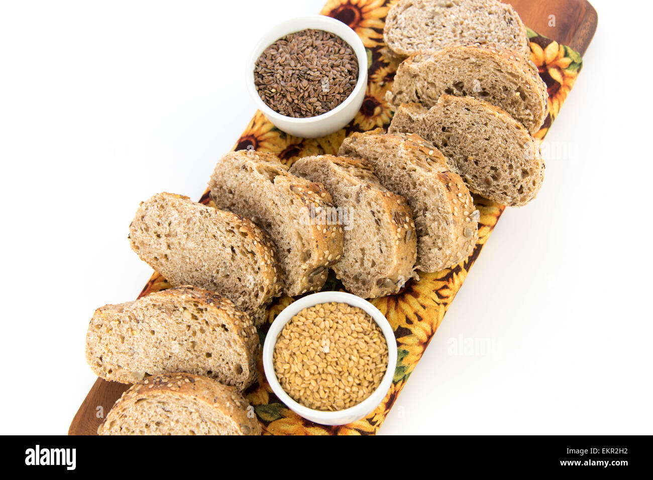 a fresh baked loaf of whole grains bread with poppy, flax and sunflower ...
