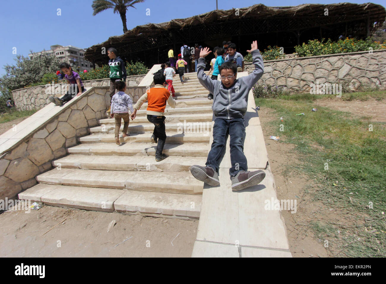 Helwan, Cairo, Egypt. 13th Apr, 2015. Egyptian children play at the ...