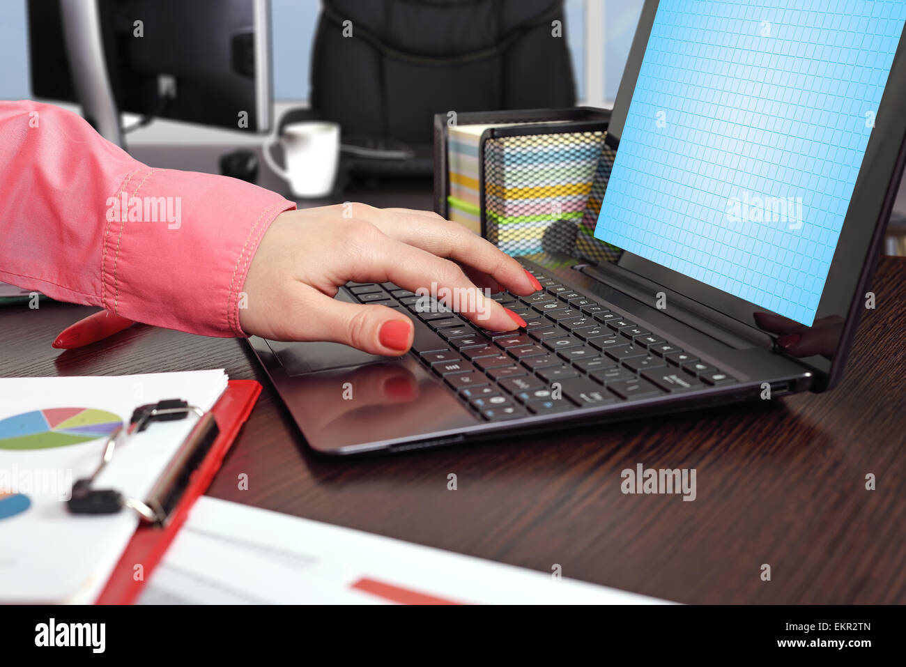Laptop with paper hi-res stock photography and images - Alamy