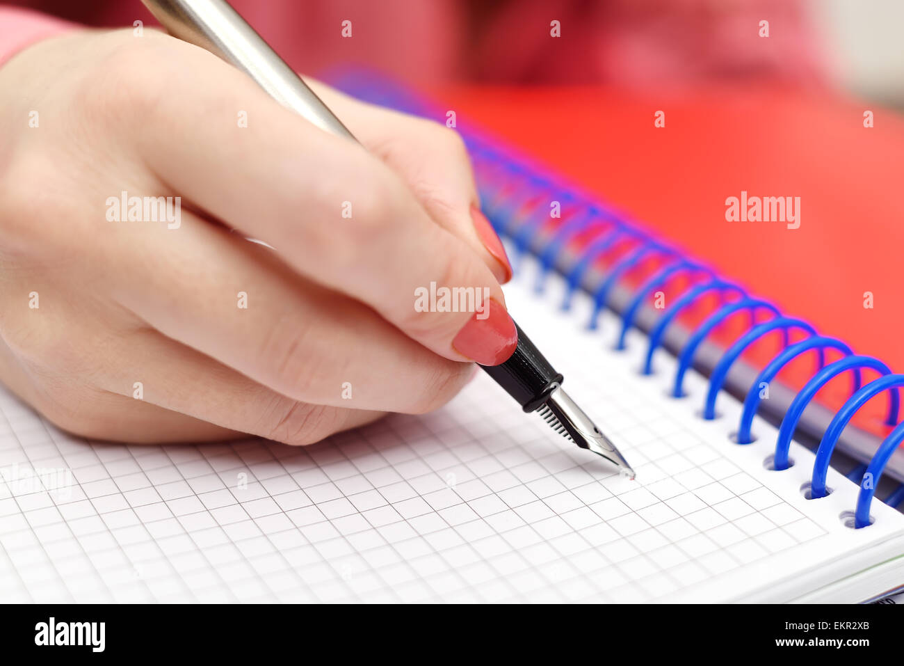 Hand reading notebook paperwork hi-res stock photography and images - Alamy