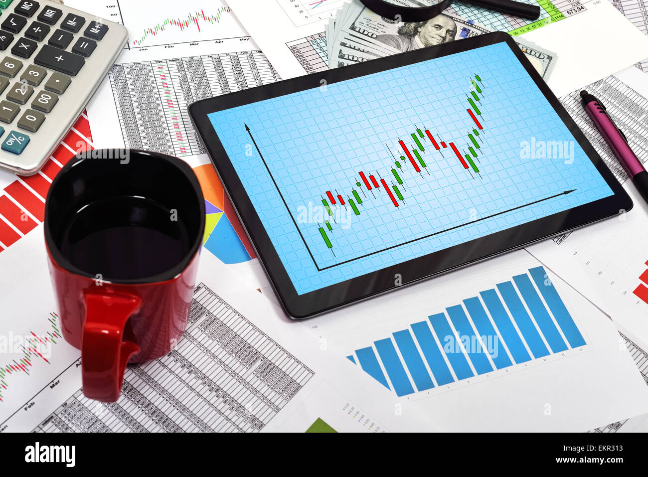 touch pad with chart on table businessman Stock Photo - Alamy