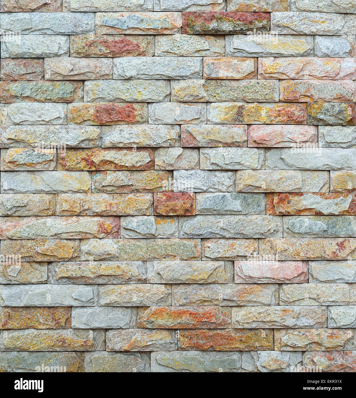 wall of color stone finishing, close up Stock Photo - Alamy