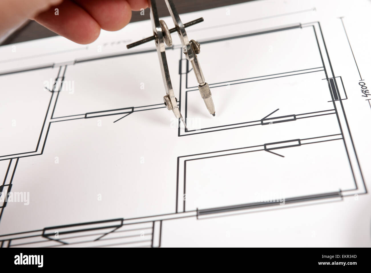 hand drawing a compass project home, close up Stock Photo - Alamy