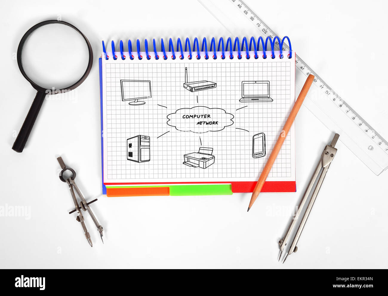 notepad with computer network on the desktop engineer Stock Photo - Alamy