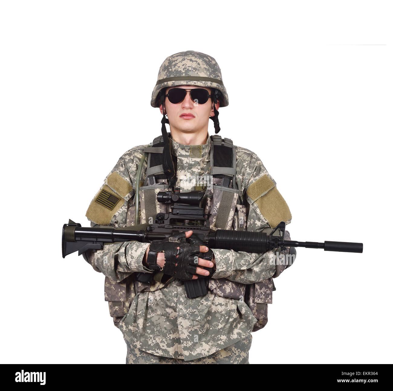 US soldier holding his assault rifle isolation on white Stock Photo - Alamy