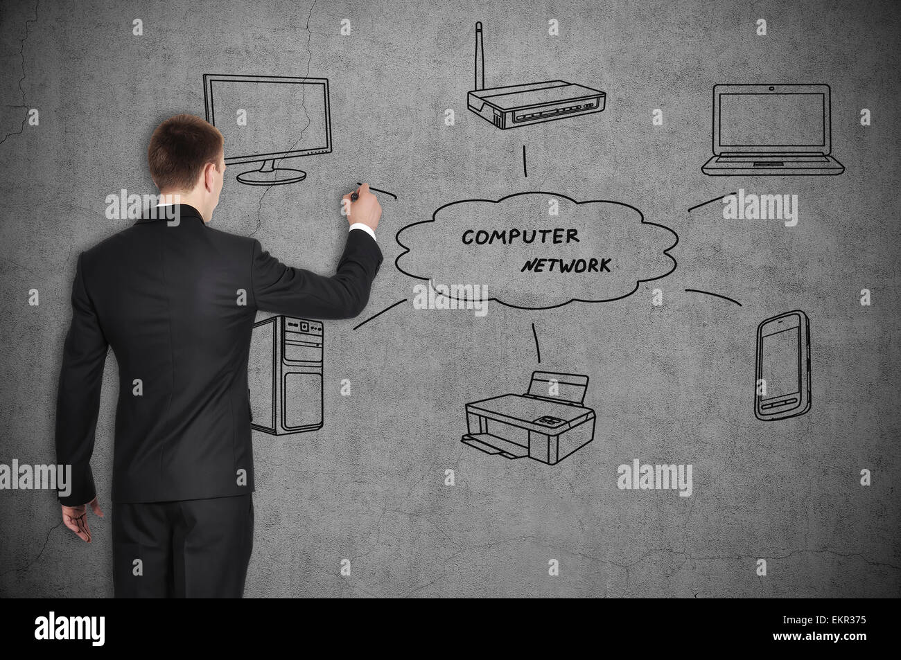 businessman drawing computer network on wall Stock Photo - Alamy