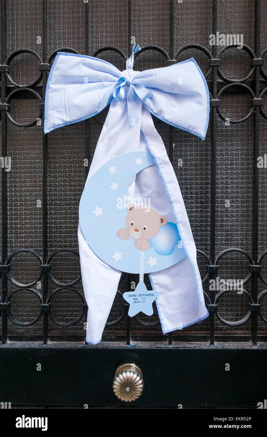 Baby with bow hi-res stock photography and images - Alamy