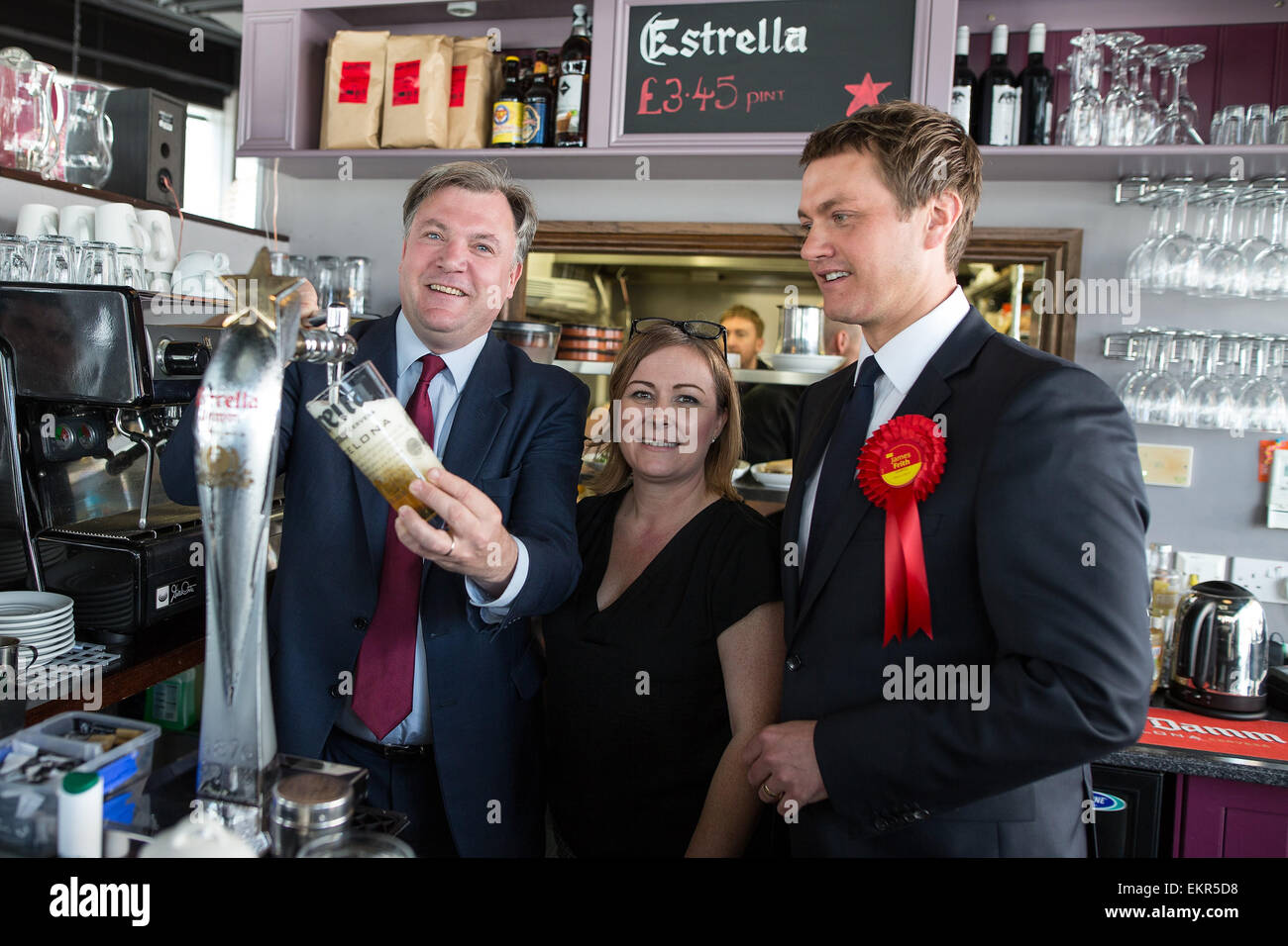 Bury, UK. 11th April, 2015. Labour Shadow Chancellor ED BALLS (l) pours ...