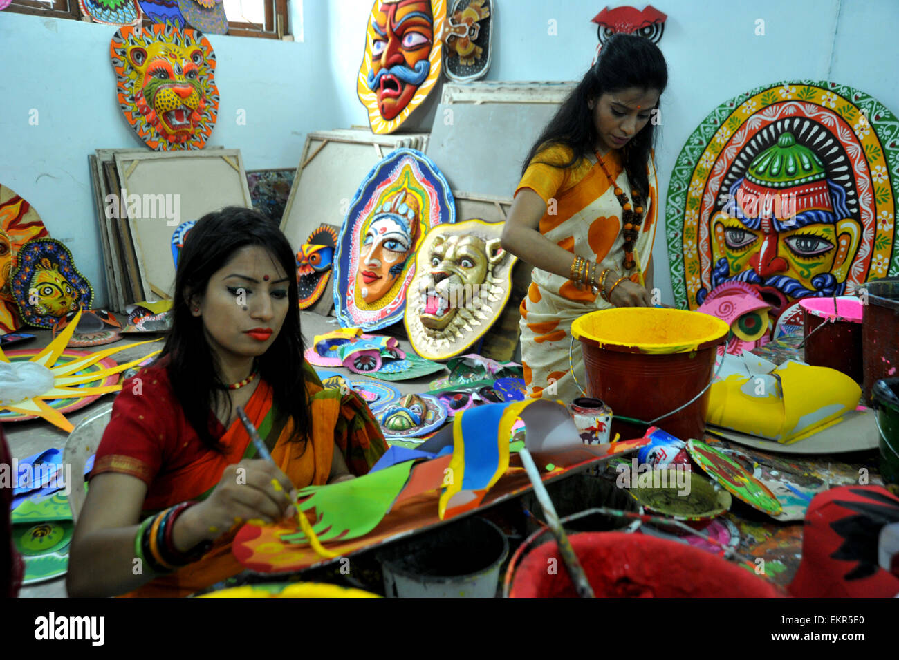 Dhaka, Bangladesh. 13th April, 2014. Students busy to create mask ...