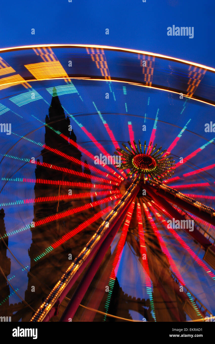The big ferris wheel shown in front of the Scott Monument, Edinburgh ...