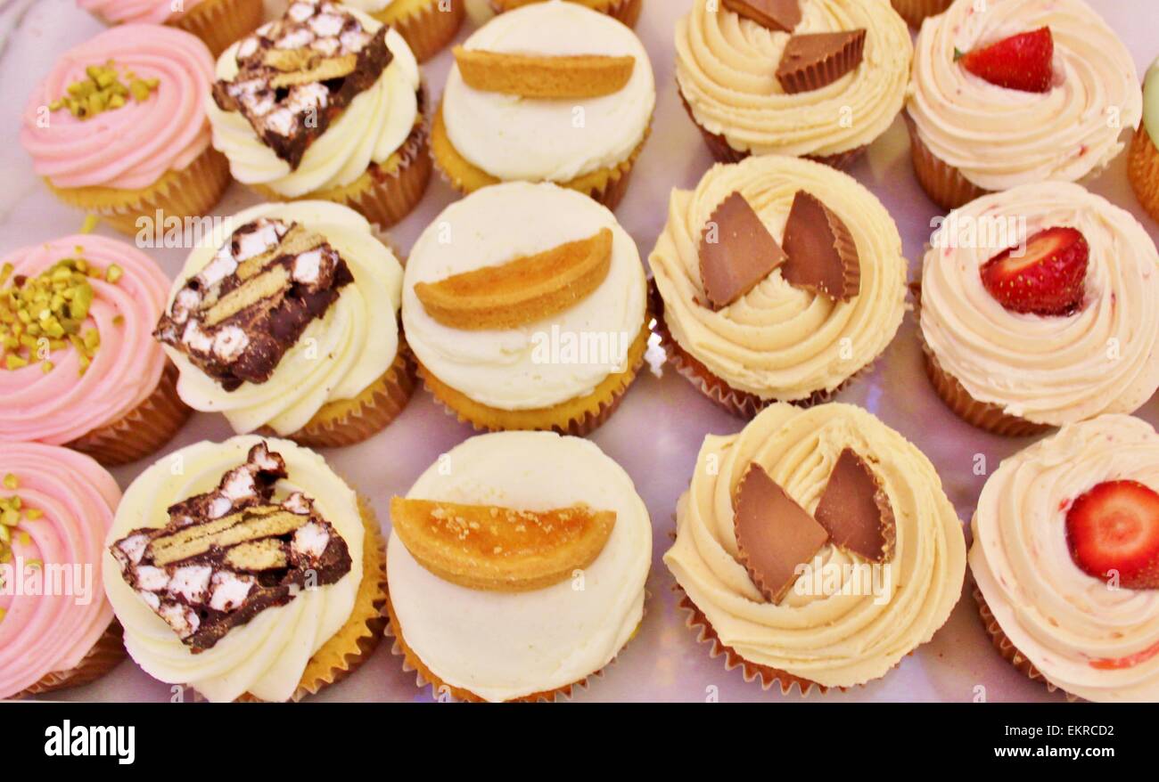 pastel colored cupcakes various Stock Photo - Alamy
