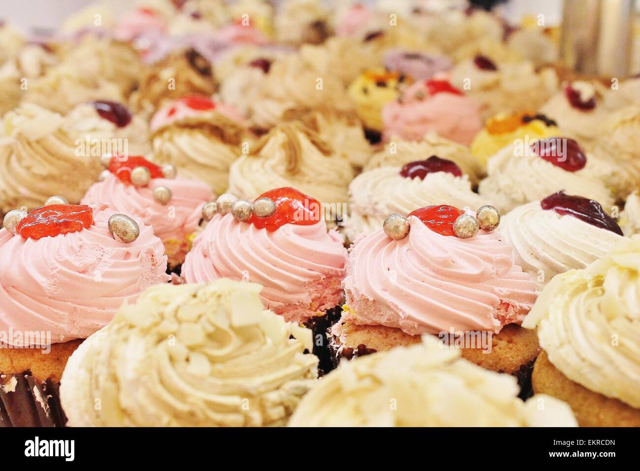 pastel colored cupcakes various Stock Photo - Alamy