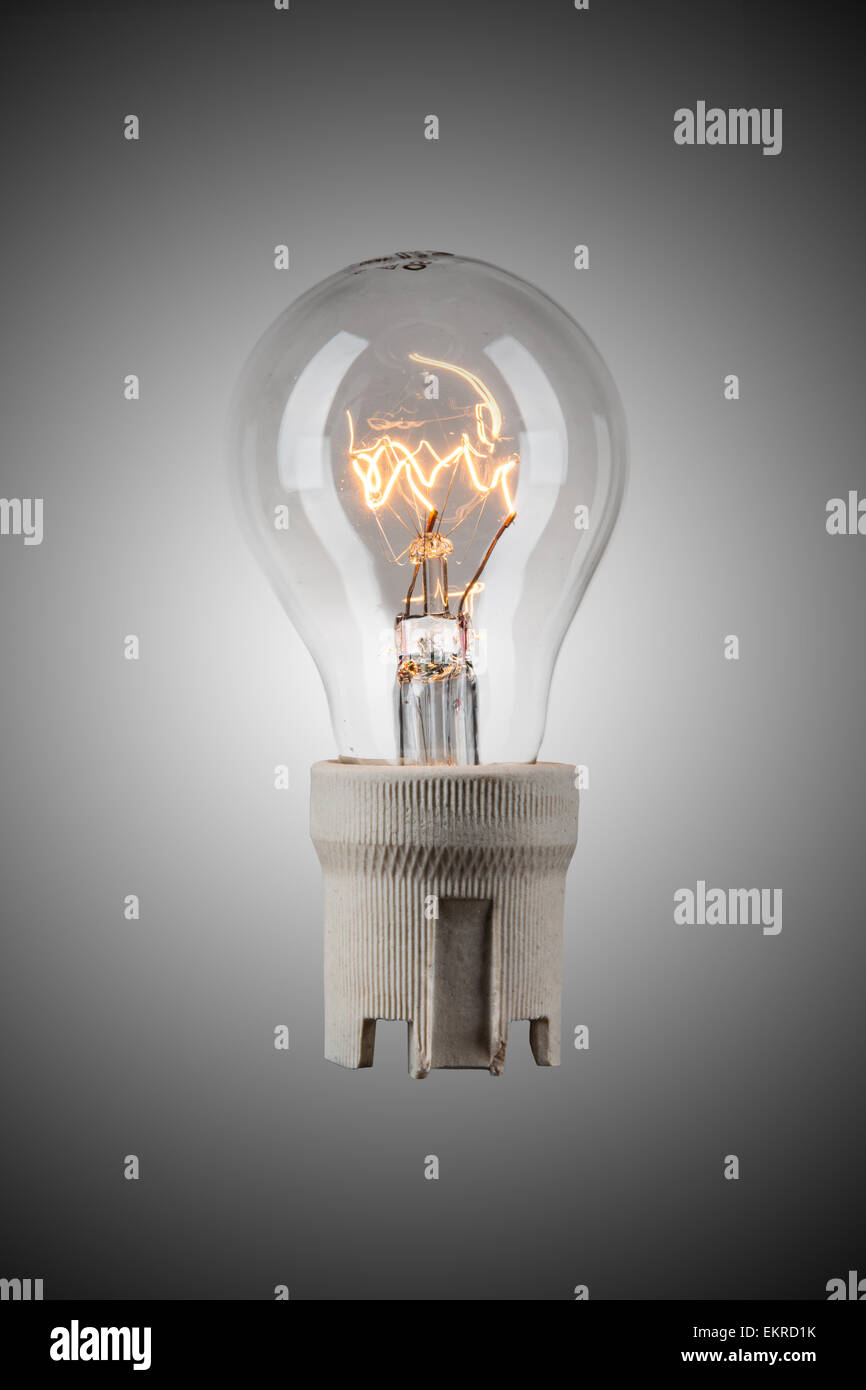 Light bulb on gray background Stock Photo - Alamy