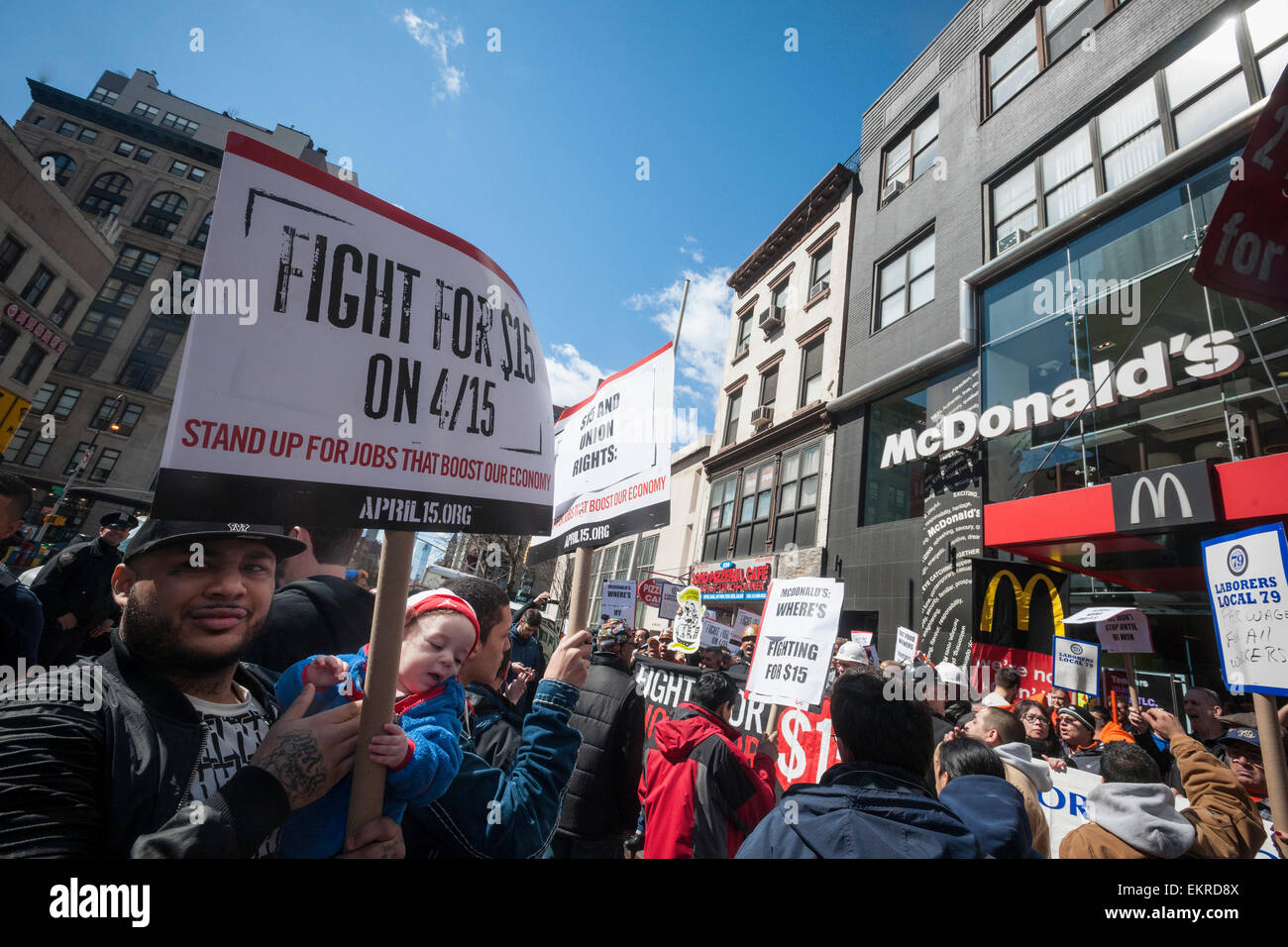 Construction workers join fast food workers at a protest in front of a ...
