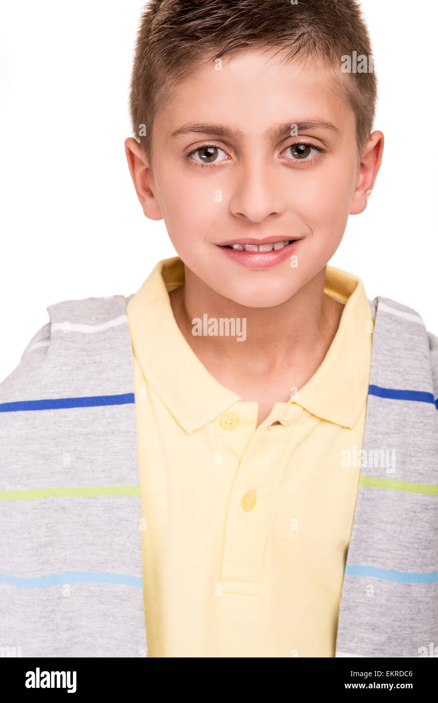 Cute blonde kid posing over white background Stock Photo - Alamy