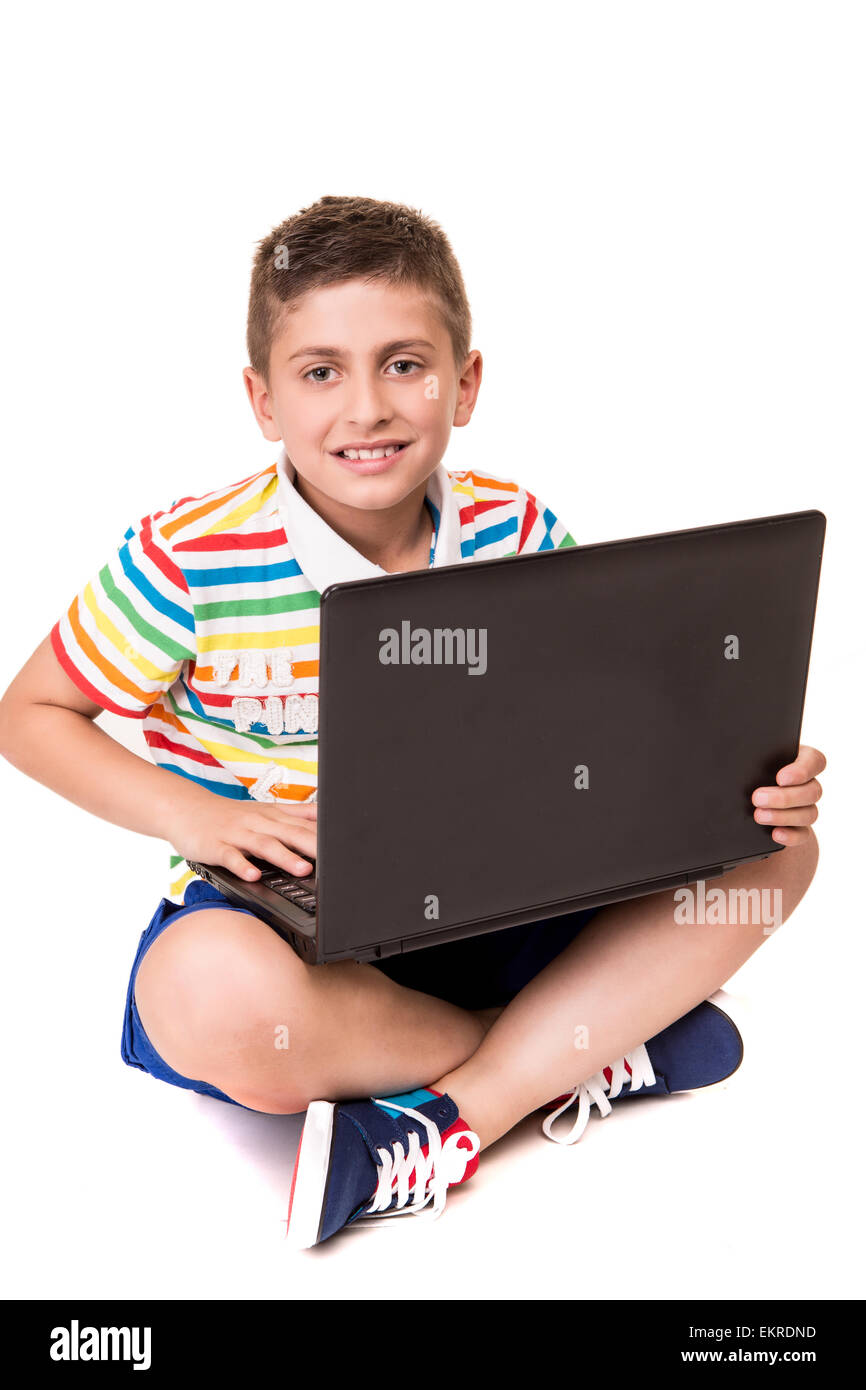 Cute blond boy using a personal computer Stock Photo - Alamy